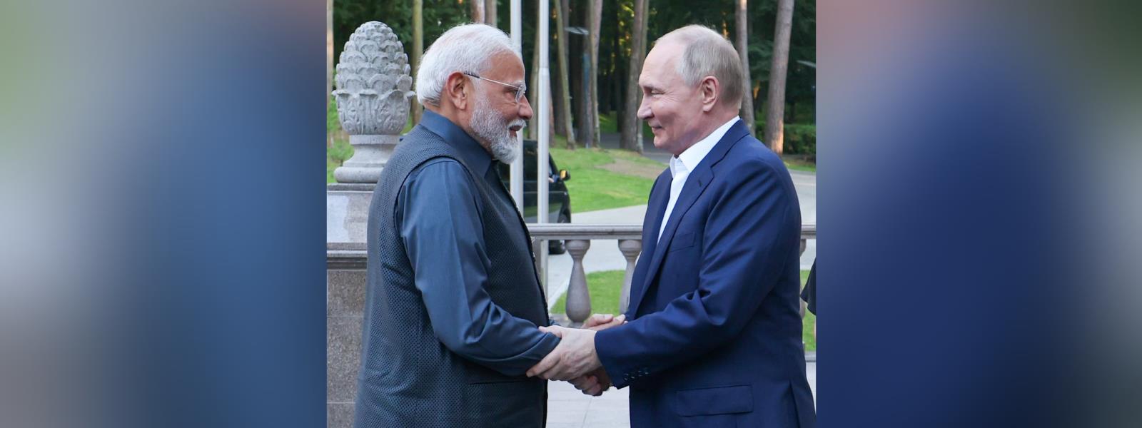 Prime Minister Shri Narendra Modi welcomed by H.E. Mr. Vladimir Putin, President of the Russian ...