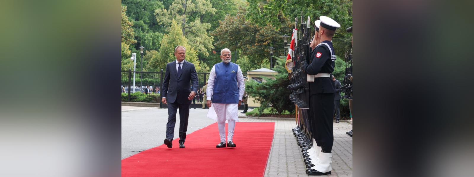 Prime Minister Shri Narendra Modi welcomed by H.E. Mr. Donald Tusk, Prime Minister of the ...