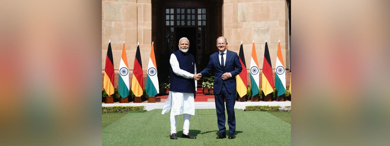Prime Minister Shri Narendra Modi welcomes H.E. Mr. Olaf Scholz, Chancellor of the Federal ...